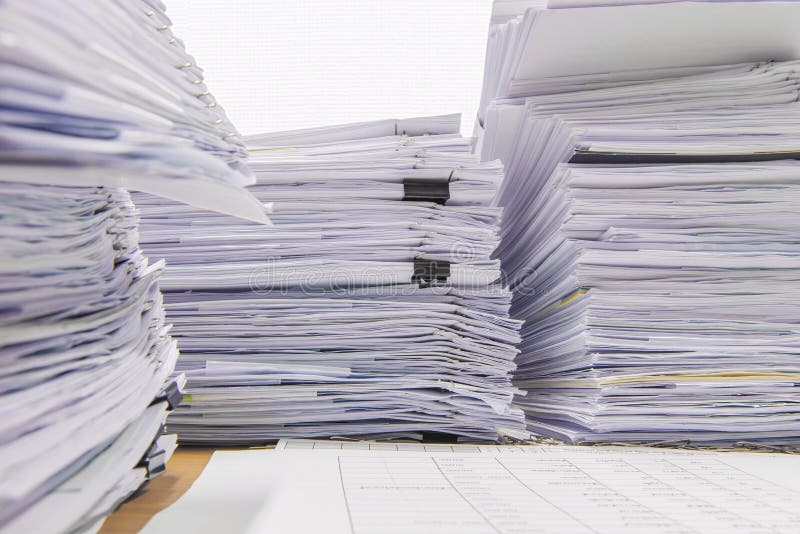 Documents on Desk Stack Up High Waiting To Be Managed Stock Photo ...