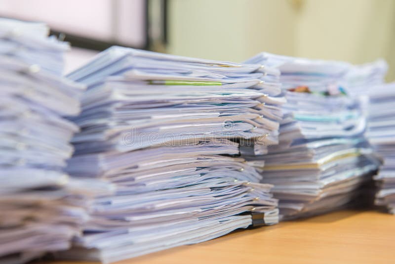 Documents on Desk Stack Up High Waiting To Be Managed Stock Photo ...