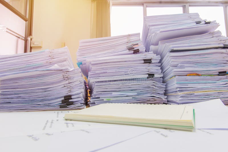 Documents on Desk Stack Up High Waiting To Be Managed Stock Photo ...
