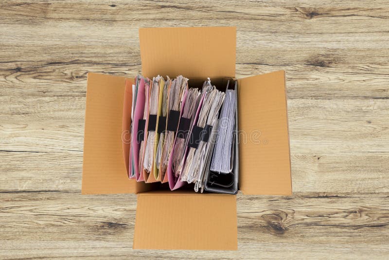 The Documents and Files are Placed in a Brown Box Stock Photo - Image ...