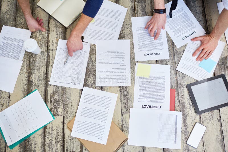 Documents in hands stock image. Image of businessgroup - 4085463