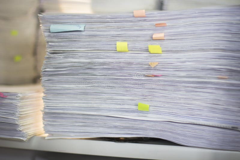 Documents in Large Quantities are on the Table. Archived Paper Reports ...