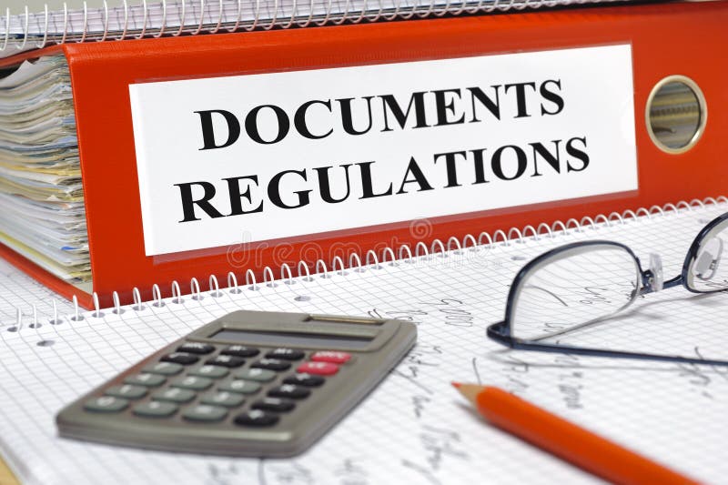 A Folder with the Label Regulations Stock Photo - Image of folders ...