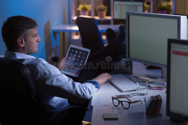 Doing overtime in office stock image. Image of chief - 55325197