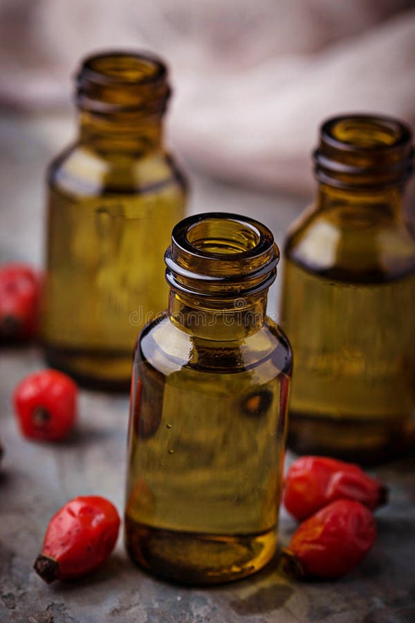 Dog Rose Essential Oil on Small Bottles Stock Image - Image of fruit ...