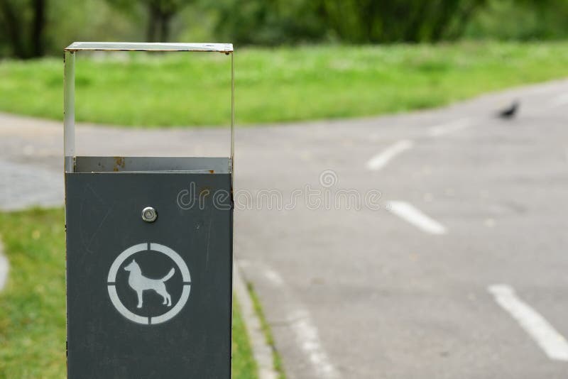 Dog Waste Container in a Park Stock Photo - Image of poop, green: 191511802
