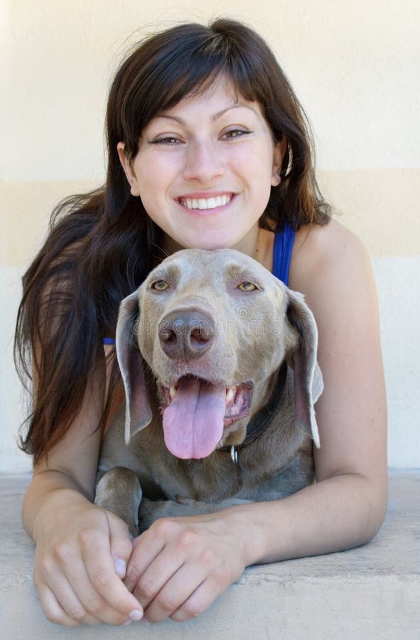 Dog and woman stock photo. Image of weimaraner, outdoors - 15092404