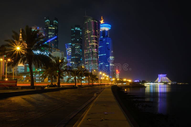 Doha corniche at night. editorial photography. Image of skyscrapers ...