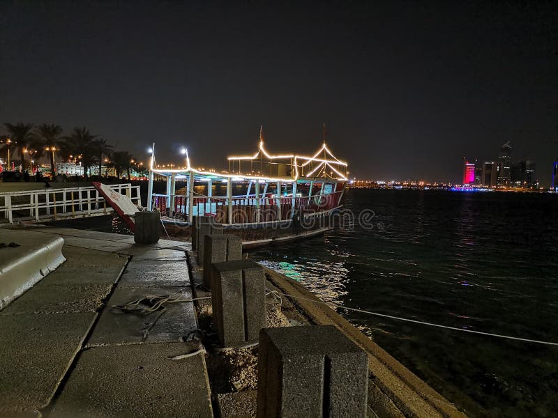 Doha Corniche stock photo. Image of walk, torch, landmark - 124893476