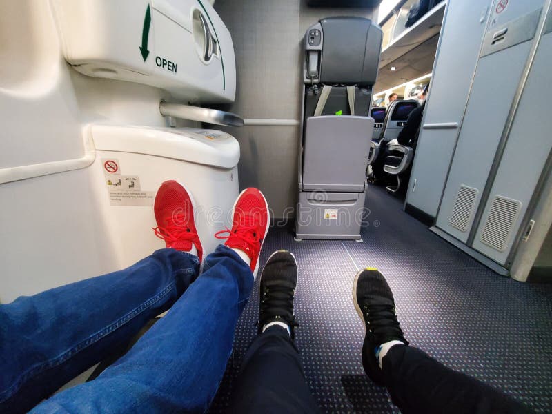 Doha, Qatar - Jan 18, 2025 - Passengers on the Exit Row Stretching ...