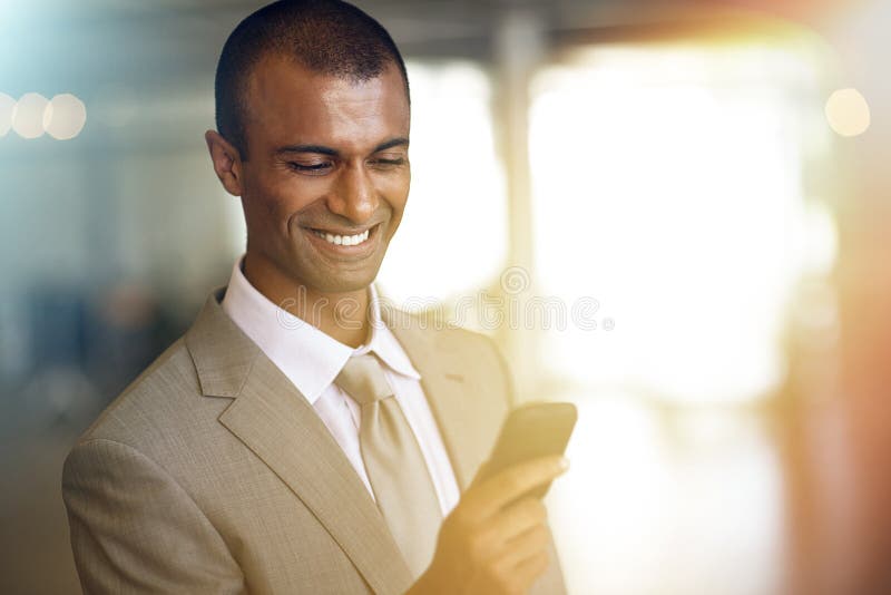 Doing Business on the Go. a Businessman Reading a Text Message. Stock ...