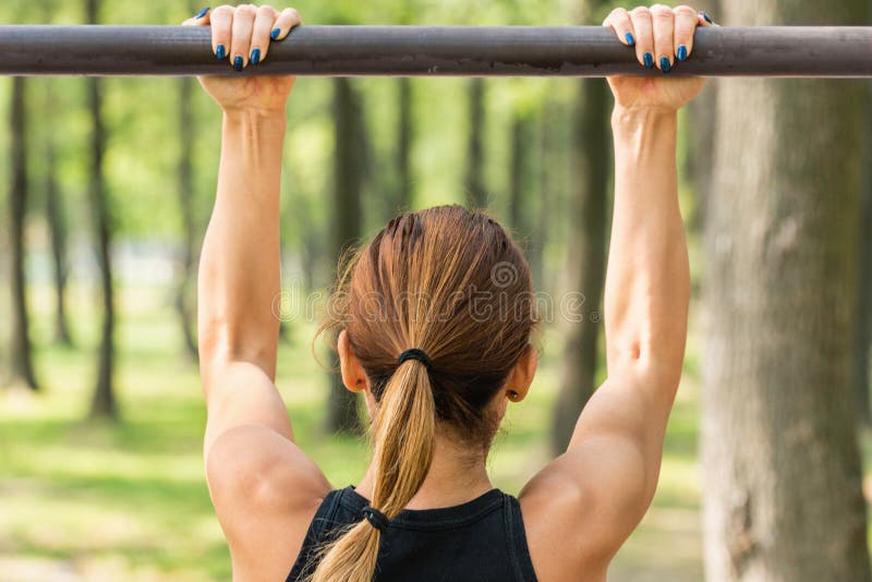 Doing chin-ups stock image. Image of hair, ethnicity - 221243147