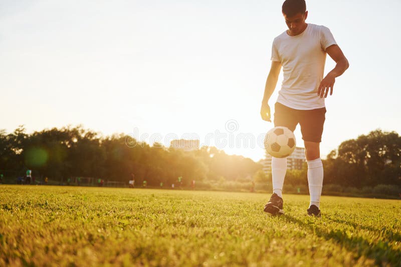 Doing Different Tricks. Young Soccer Player Have Training on the ...