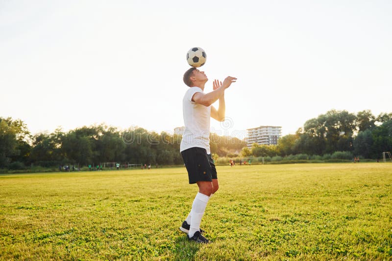 Doing Different Tricks. Young Soccer Player Have Training on the ...