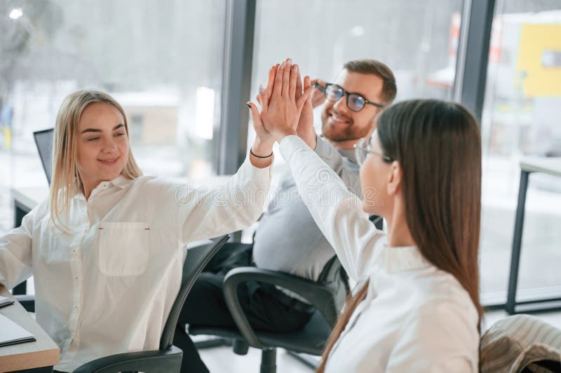 Doing High Five. Successful Team are Working Together in the Office ...