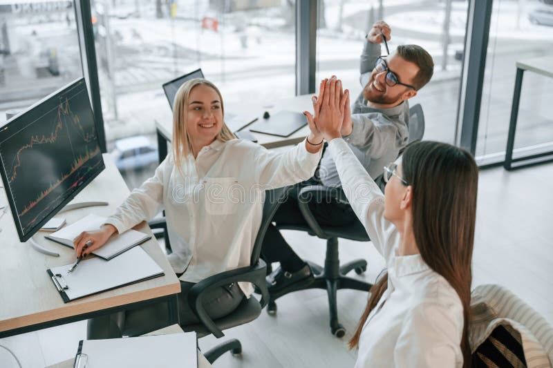 Doing High Five. Successful Team are Working Together in the Office ...