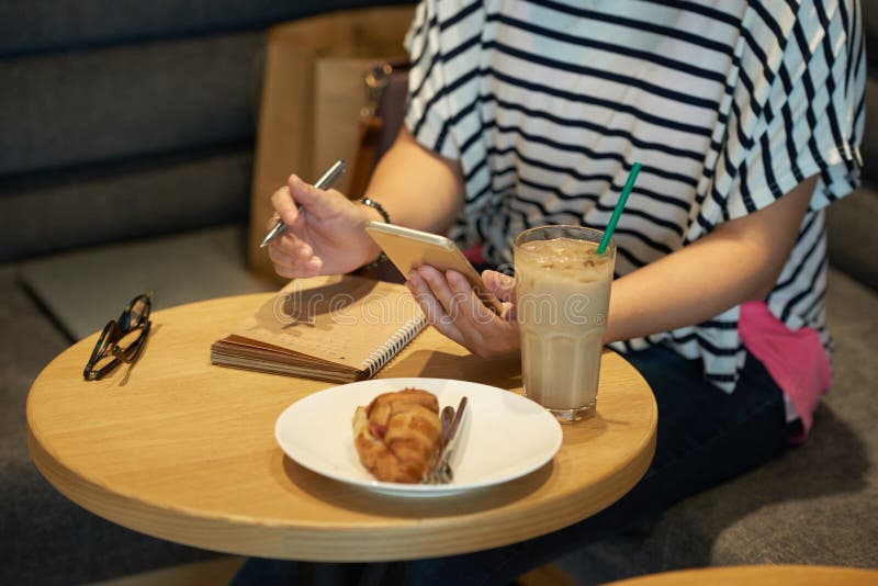 Doing homework in cafe stock image. Image of creative - 108182903