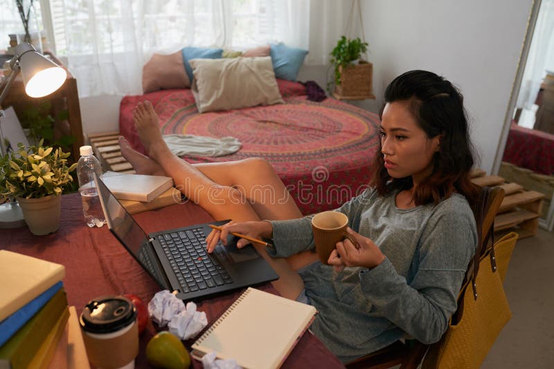 Doing homework stock photo. Image of night, drinking - 119470518
