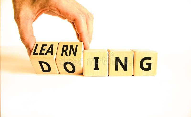 Doing or Learning Symbol. Businessman Turns Wooden Cubes and Changes ...