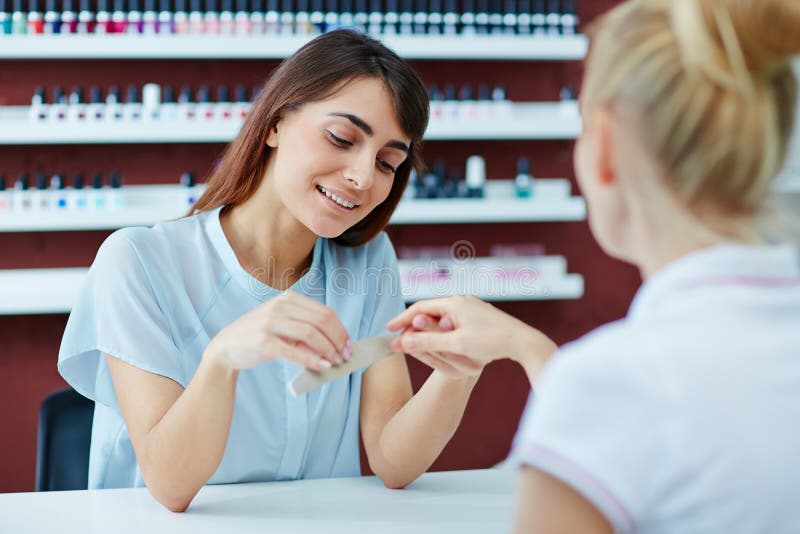 Doing manicure stock photo. Image of procedure, manicure - 75984590
