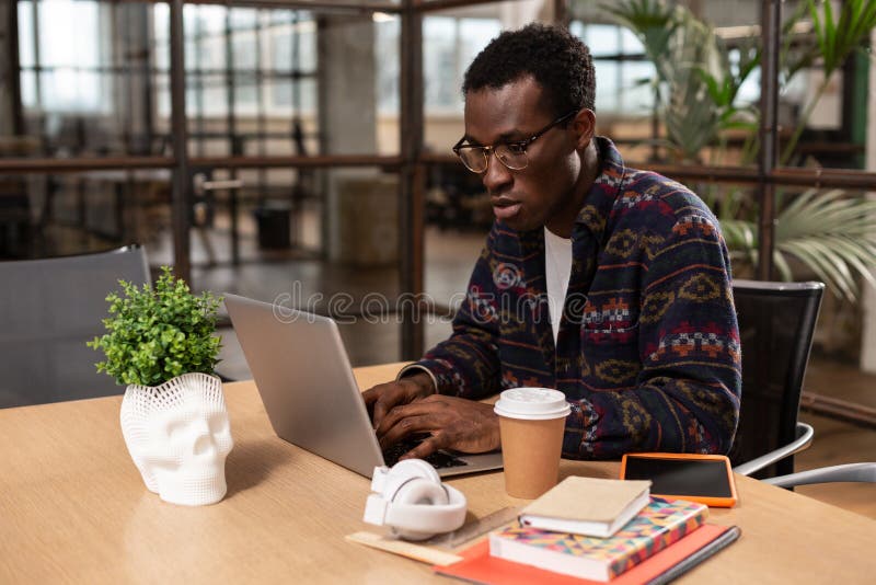 Concentrated Young Man Doing Office Work in the Workplace Stock Photo ...