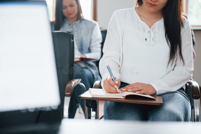 Doing Some Notes. Group of People at Business Conference in Modern ...