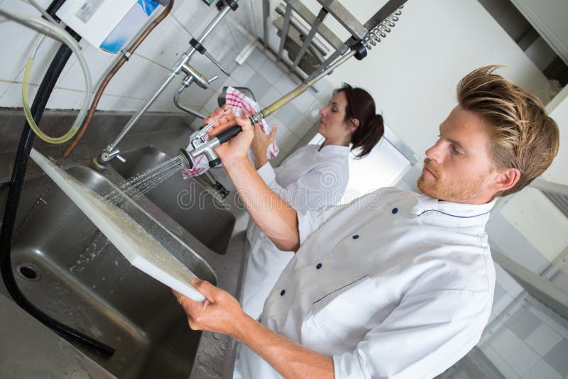 Doing Washing Up in Kitchen Stock Photo - Image of housework, chef ...