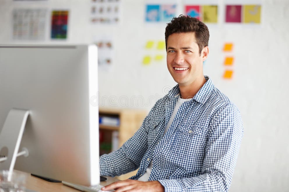 Doing What he Knows Best. Portrait of a Young Designer Working at a ...