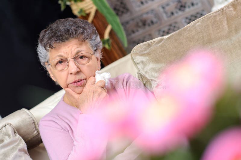 Doleful lady sat alone stock image. Image of elderly - 124011197
