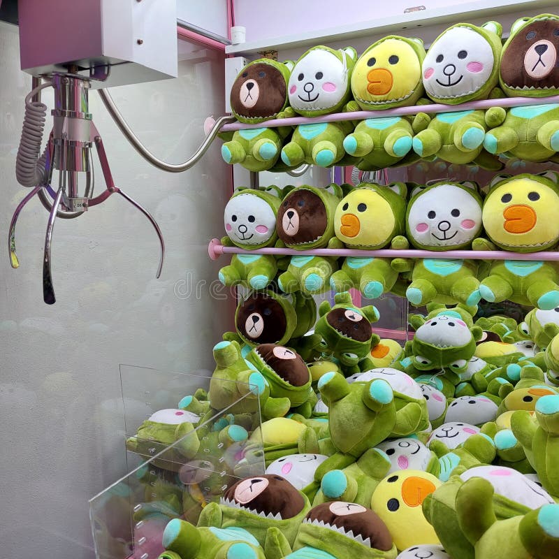 Doll Clamping Dexterity Game Machine Stock Photo - Image of green, play ...