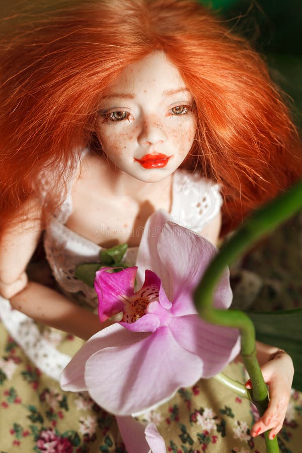 Doll and flower stock photo. Image of bloom, items, pretty - 109080056