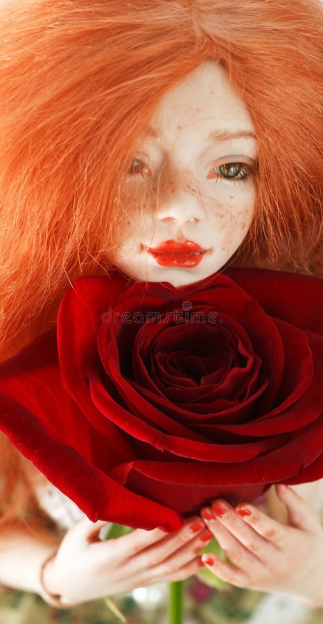 Doll and flower stock image. Image of face, lady, redhead - 109685631