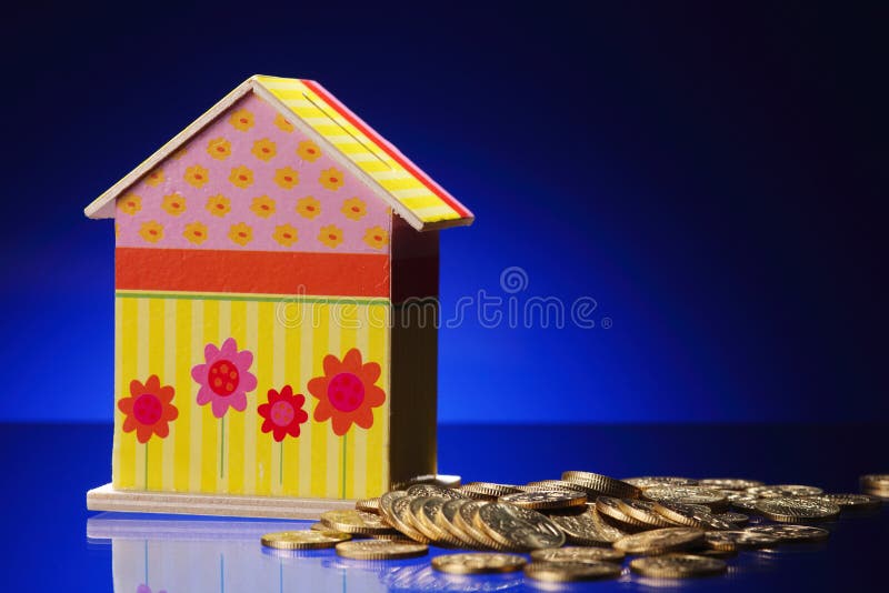 Doll house and coin stock image. Image of play, close - 48903869