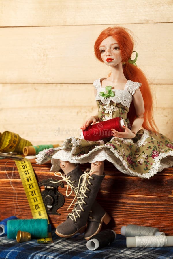 Doll and thread stock photo. Image of tailor, doll, sewing - 112677986