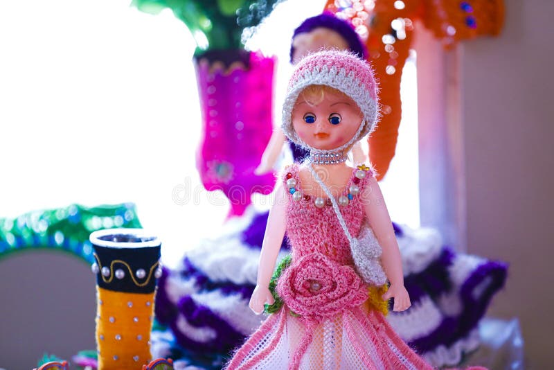 Doll toy on the table stock photo. Image of girls, dress - 218400660