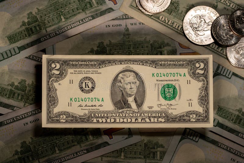 2 Dollar Banknote on Top of Different Denominated USD Banknotes Stock ...