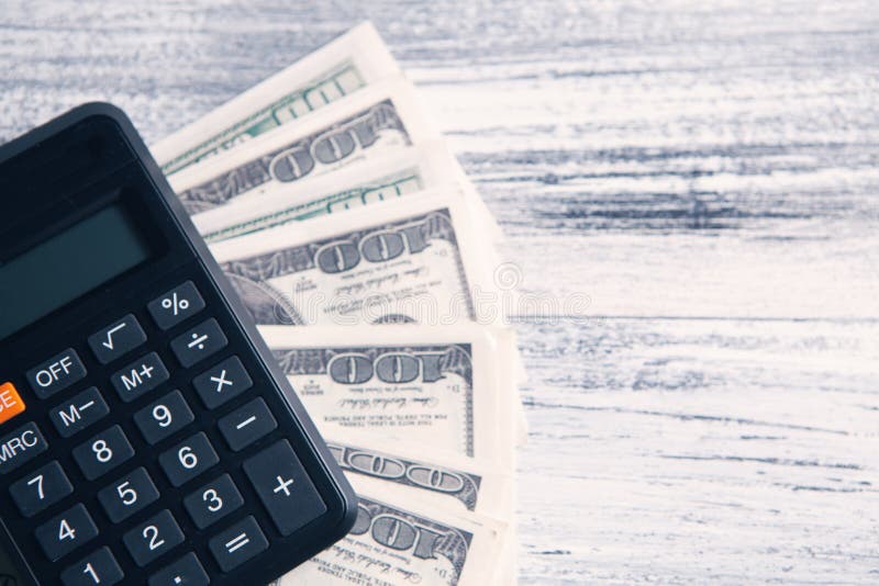 Dollar bill calculator stock photo. Image of business - 235648632