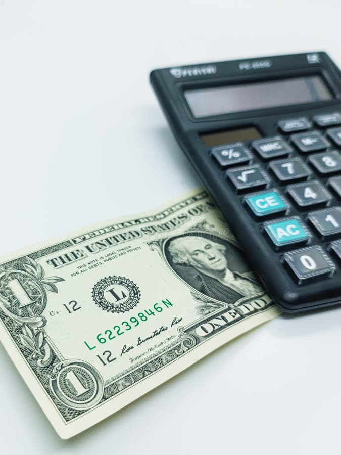Dollar Bill and Calculator Isolated in White Editorial Image - Image of ...
