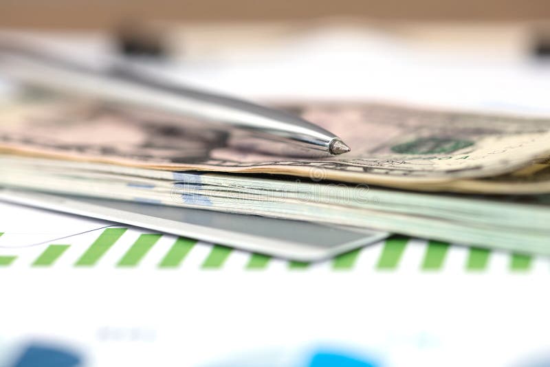 Dollar Bills and Bank Cards on Financial Documents Stock Photo - Image ...