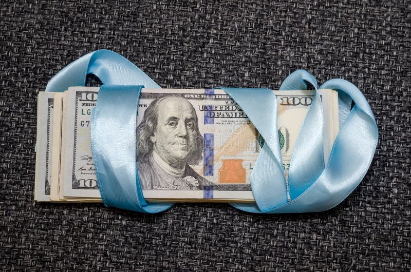 Dollar Bills in Blue Gift Ribbon Stock Photo - Image of business, blue ...
