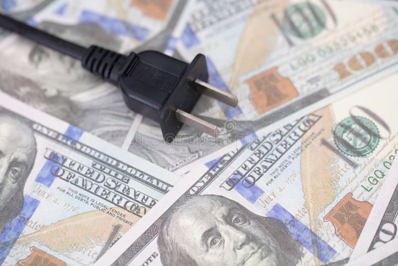Dollar Bills and Coins and an Electric Plug Stock Image - Image of ...