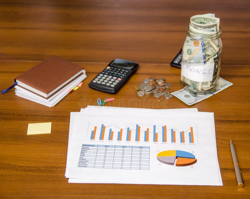 Dollar bills and graphs stock photo. Image of exchange - 70662638