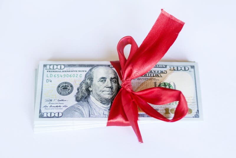 100 Dollar Bills With Red Ribbon On A White Background Stock Photo ...