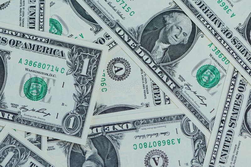 Dollar Bills Scattered Across a Flat Surface Showcasing Monetary Value ...