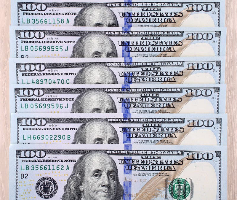 Dollar bills on the table stock photo. Image of isolated - 69109904