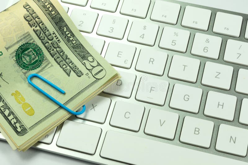 Dollar Bills and a Computer Stock Photo - Image of business, economy ...