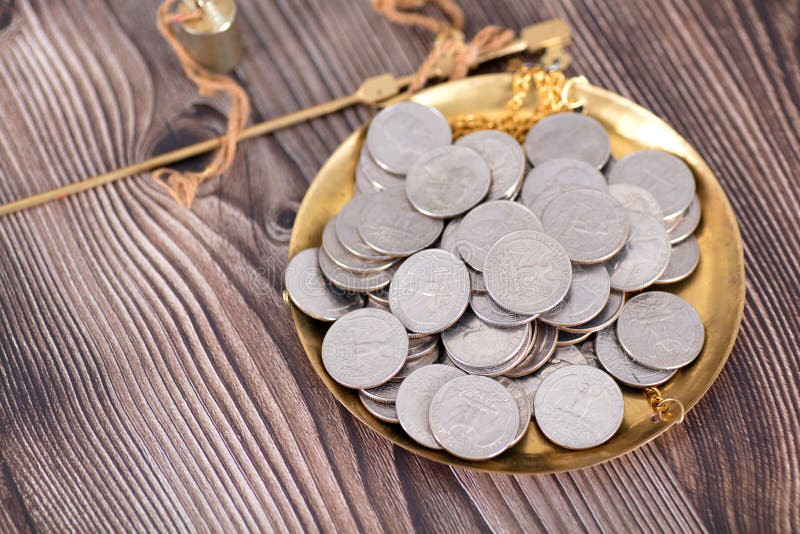 Dollar Coins in Weighing Pan Stock Photo - Image of large, dollar ...