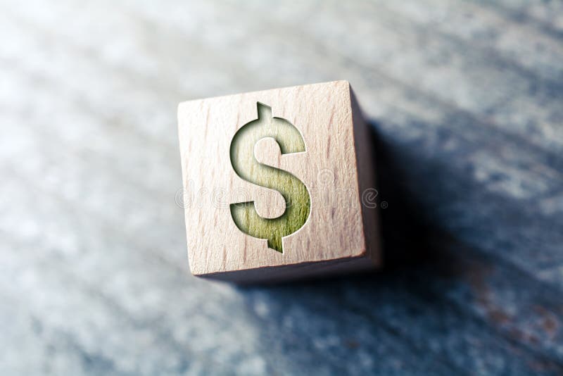 Dollar Currency Sign Written on Wooden Blocks on a Board Stock Photo ...