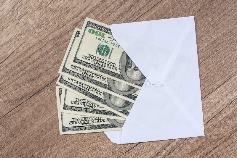 Dollar in Envelope on Desk. Stock Photo - Image of envelope, banknote ...
