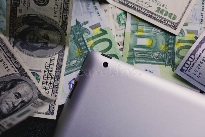 Dollar and Euro Money, Tablet, Cell Phone Close Up. Stock Image - Image ...